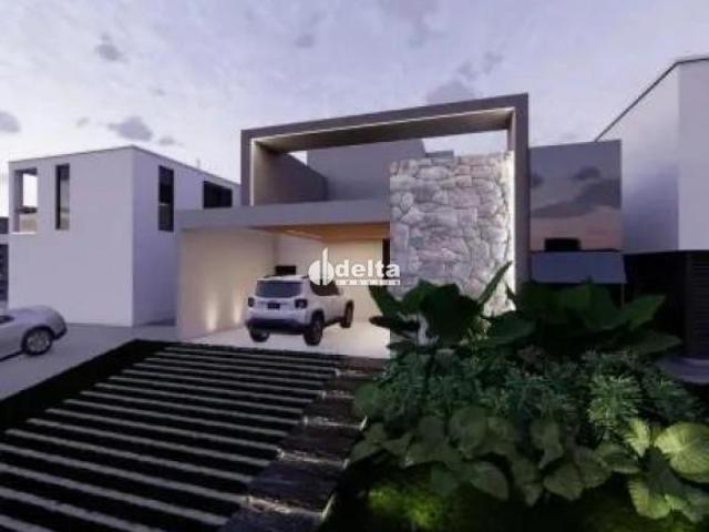 Casa em condomínio com 3 suítes disponível para locação no bairro Granja Marileusa em Uberlândia MG