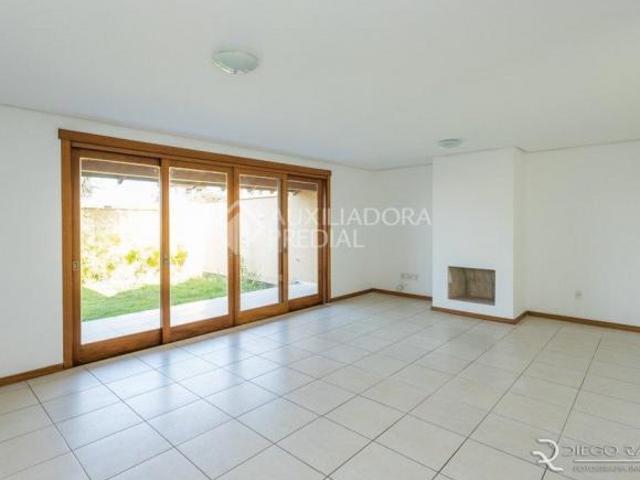 CASA EM CONDOMINIO COM 3 SUÍTES E SEGURANÇA E INFRA ESTRUTURA JUNTO AO COLEGIO FARROUPILHA
