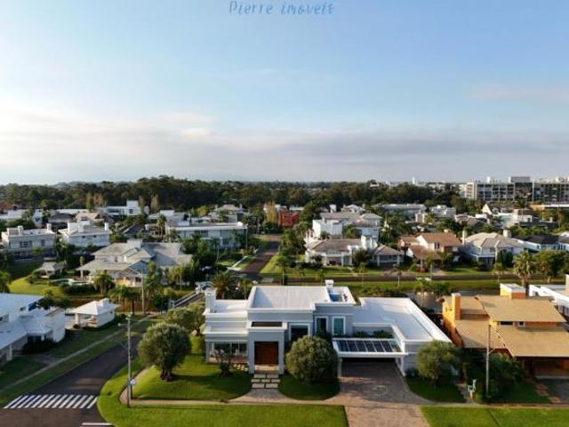 Casa em condomínio com 3 suites, 700m², à venda em Xangri Lá