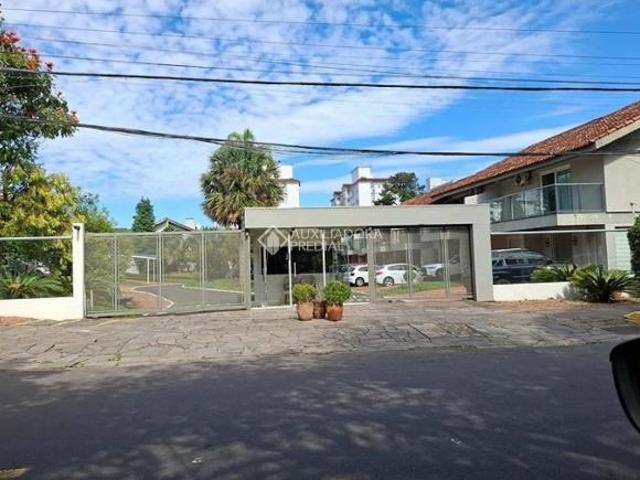 Casa em condomínio com 3 quartos e suíte no bairro Tristeza