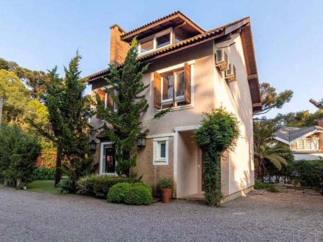 CASA EM CONDOMÍNIO COM 4 DORMITÓRIOS