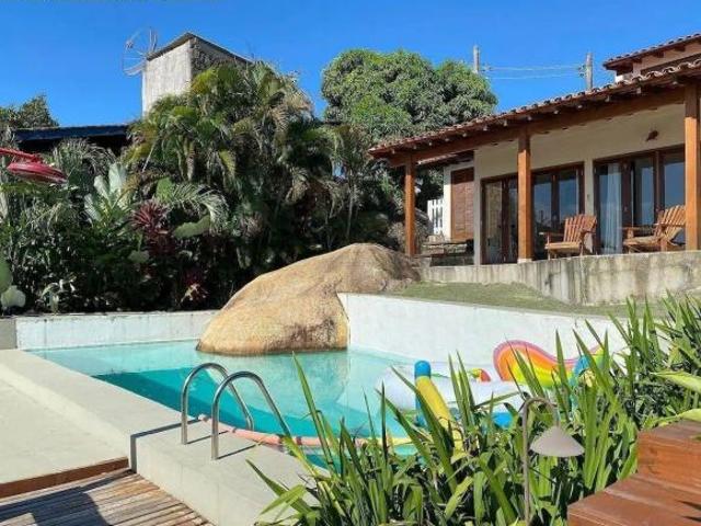 Casa em condomínio com 4 dormitórios 2 vagas a venda em Ilha Bela