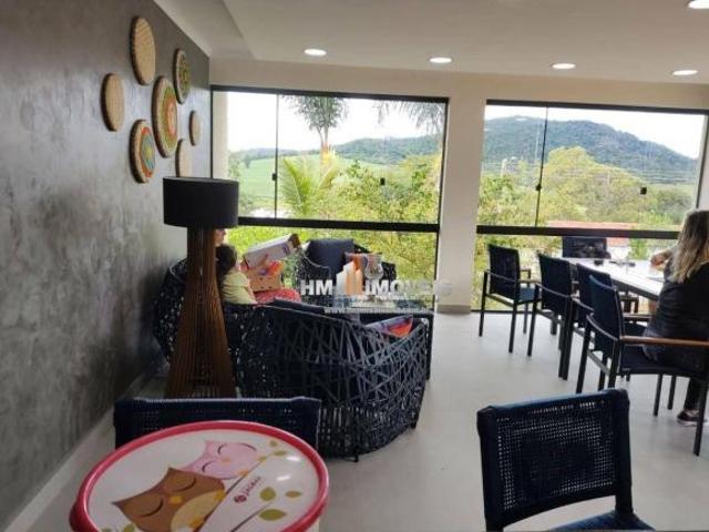 Casa em Condomínio com 4 dormitórios, 2 suítes, 3 salas, área gourmet, jardim, piscina aquecida, na