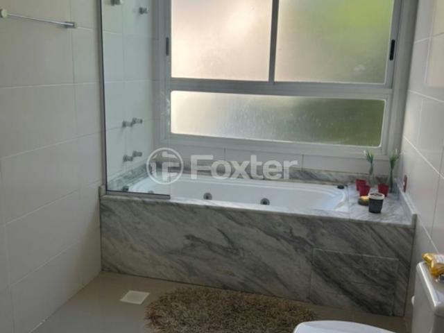 Casa em Condomínio com 4 dormitórios em Florianópolis