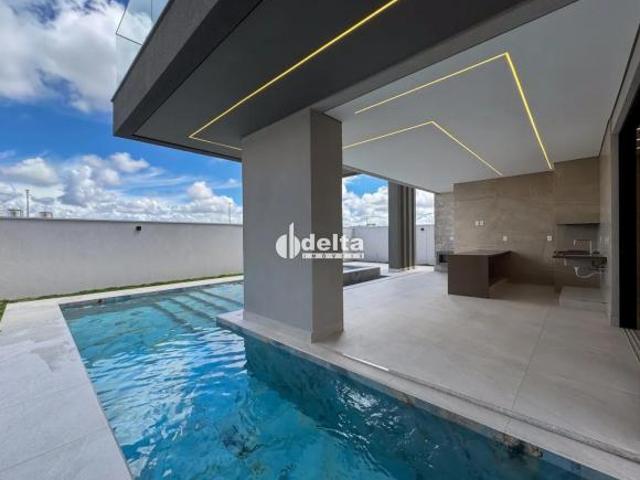 Casa em condomínio com 4 suítes disponível para venda no bairro Jardim Sul em Uberlândia MG