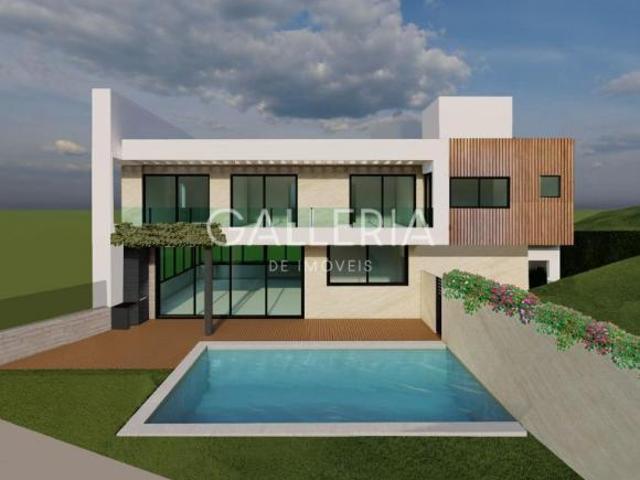 Casa em condomínio com 4 suítes e piscina no Campo Comprido