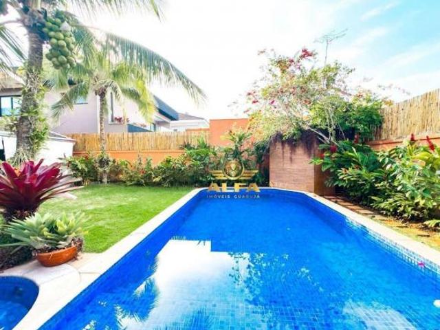 Casa em condomínio com 4 suítes, piscina e espaço gourmet no Jardim Acapulco – Alfa Imóveis Guarujá