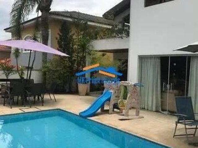 Casa em Condomínio com 4 suítes, 420 m² por R$ R$ 2.750.000,00 Alphaville