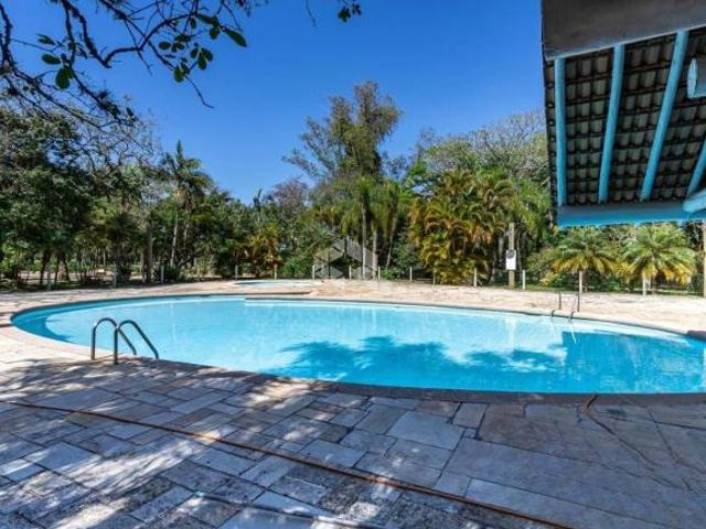 Casa em condomínio com 4 quartos, sendo 4 suítes, 506m², 4 vagas no Bairro Terra Ville Porto Alegre