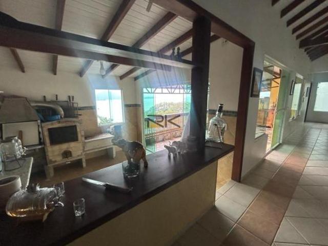 CASA EM CONDOMINIO COM 5 DORMITÓRIOS,4 VAGAS DE GARAGEM,VARANDA GOURMET COM CHURRASQUEIRA E PISCINA