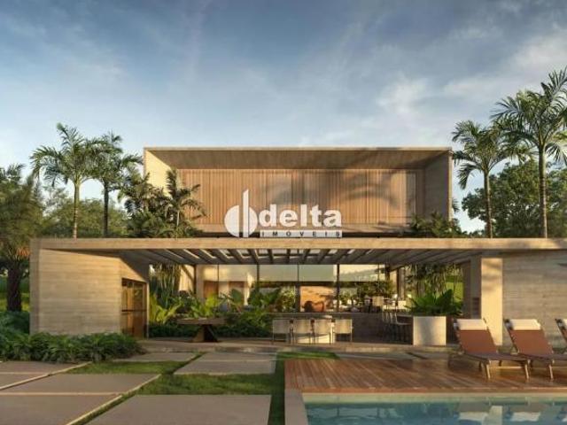 Casa em condomínio com 5 suítes disponível para venda no bairro Área Rural em Uberlândia MG
