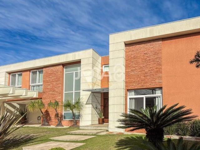 CASA EM CONDOMINIO COM 5 SUÍTES UBERABA
