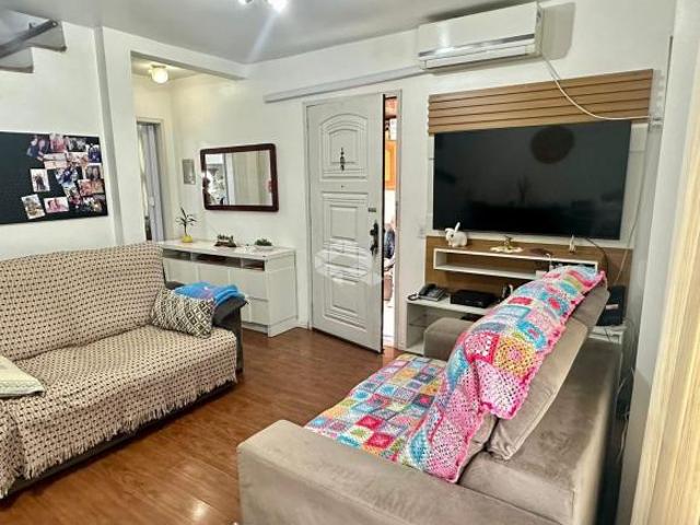 Casa em condomínio com 96m² no bairro Tristeza