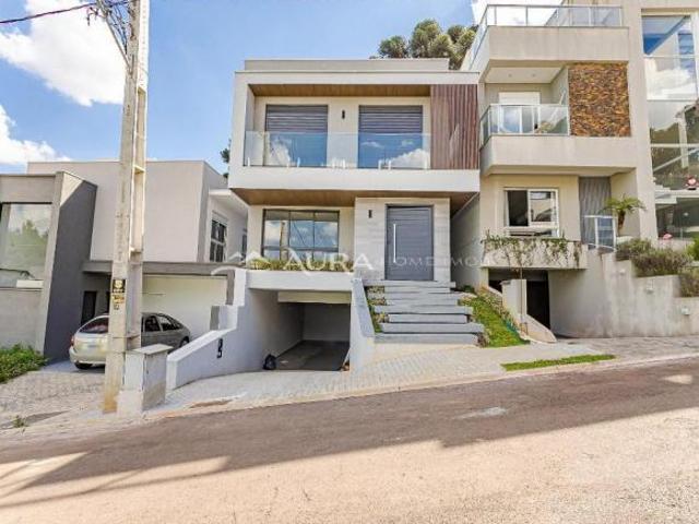 Casa em condomínio clube com 230m² e 3 suítes à venda no bairro Santa Cândida
