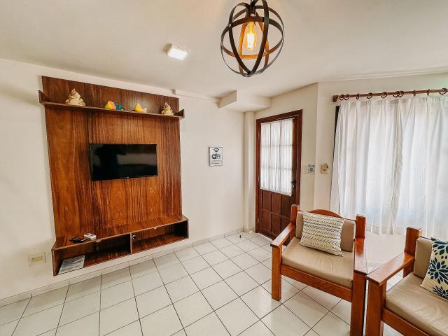 Casa em condomínio a 250m da praia de Taperapuã, 3 suítes, piscina, sauna, portaria 24hrs, internet exclusiva 300MBPS