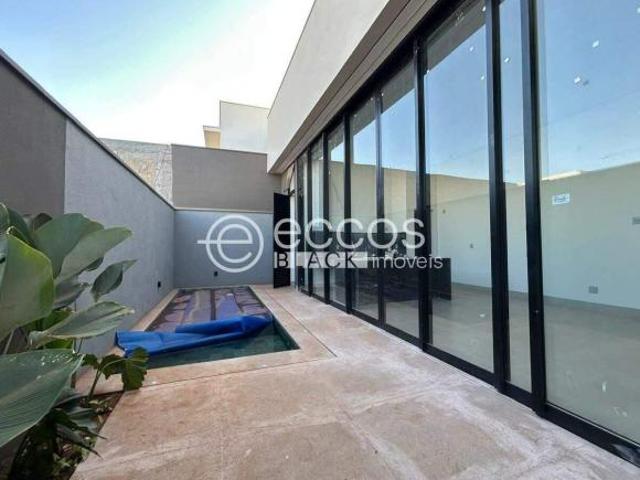 Casa em condomínio à venda, 3 quartos, 3 suítes, 2 vagas, Jardim Botânico Uberlândia/MG