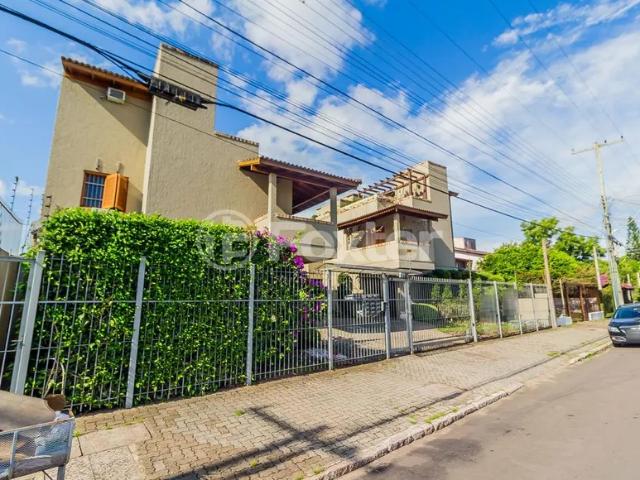 Casa em Condomínio à venda Avenida Guarujá, Porto Alegre