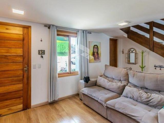 Casa em Condomínio à venda com 3 dormitórios e 89 m² no bairro Lomba do Pinheiro em Porto Alegre