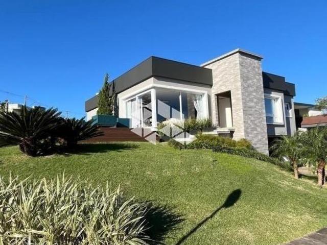 Casa em Condomínio à venda com 3 suítes, 253m² e 2 vagas no Alphaville Porto Alegre