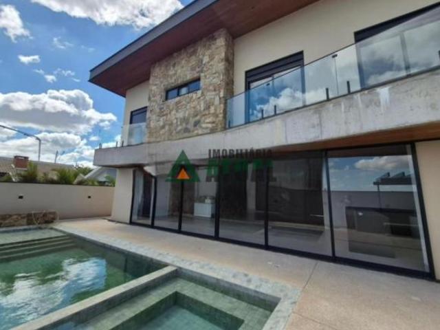 CASA EM CONDOMINIO A VENDA COM 3 SUÍTES C/CLOSET
