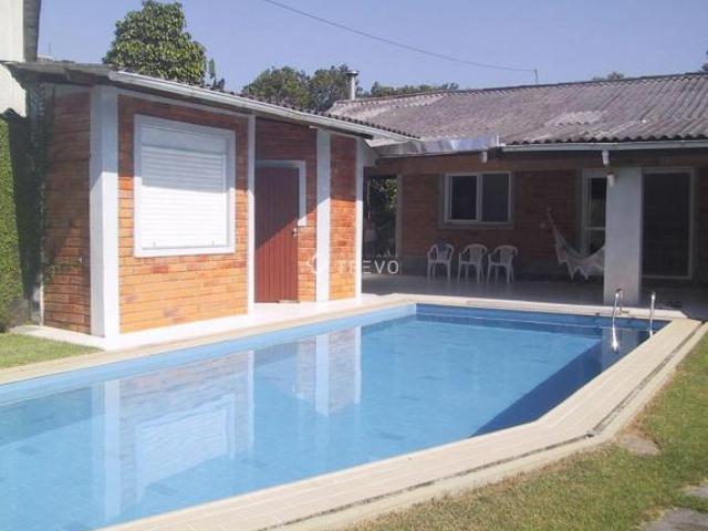 CASA EM CONDOMÍNIO À VENDA COM 4 DOMITÓRIOS 3 BANHEIROS 6 VAGAS EM BERTIOGA/SP