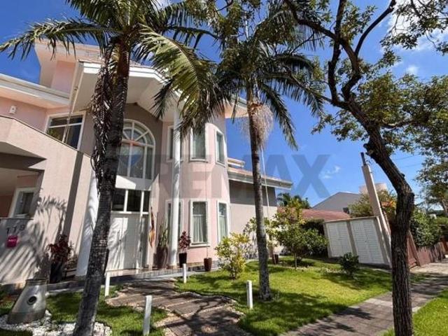 Casa em condomínio a venda com 4 suites