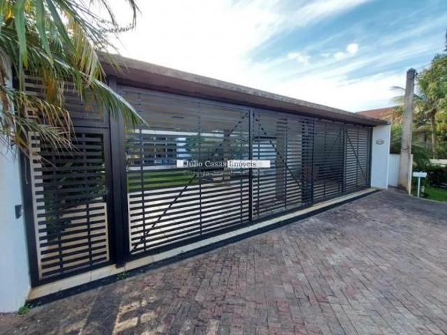 Casa em condomínio a venda com 4 suítes
