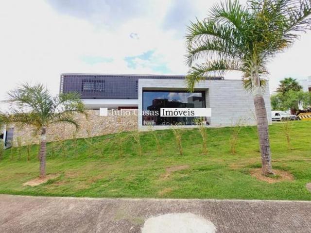 Casa em condomínio a venda com 4 suítes