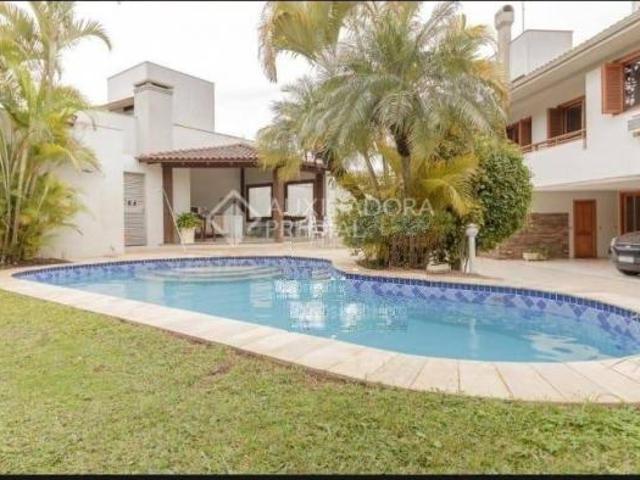 Casa em condomínio a venda com 4 suítes no Bairro Três Figueiras