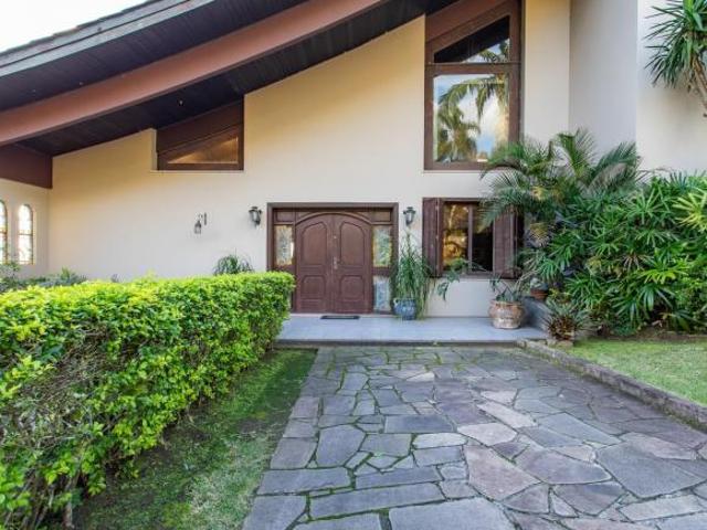 Casa em Condomínio à venda com 5 dormitórios, 565m² e 4 vagas no Condominio Jardim do Sol, Zona Sul