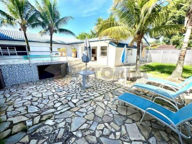 Casa em condomínio à venda com 5 suítes no Massaguaçu em Caraguatatuba SP