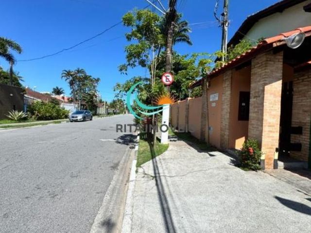 Casa em condomínio à venda em Bertioga SP, Centro: 2 suítes, 2 salas, churrasqueira e piscina 2 vaga