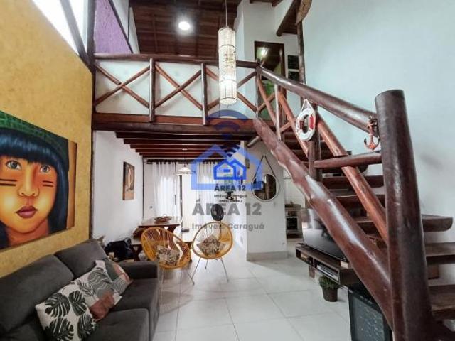Casa em condomínio à venda no bairro Martim de Sá em Caraguatatuba, SP com 02 dormitórios, 02 vagas