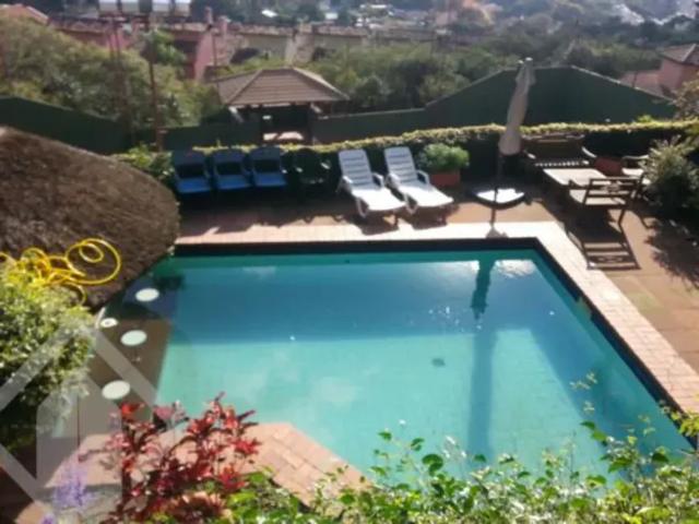 Casa em condomínio à venda no bairro Santa Tereza com 5 dormitórios/quartos e 842 m²