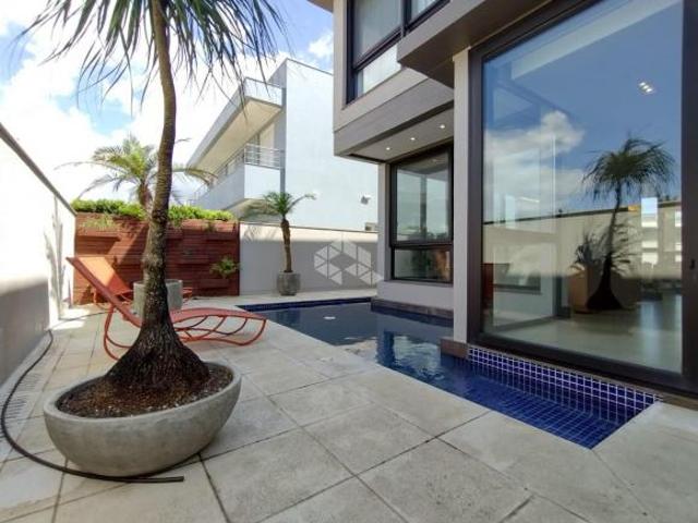 Casa em Condomínio à venda, no condomínio Playa Vista Xangri Lá, com 4 quartos 4 suítes