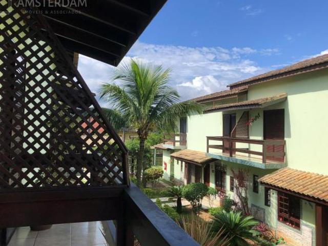 Casa em condomínio à venda no Indaiá frente ao Mar, reformada, 2 dormitórios, área gourmet, 1 vaga