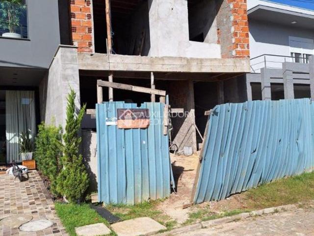 Casa em condomínio alto padrão com 3 suítes no bairro Ipanema