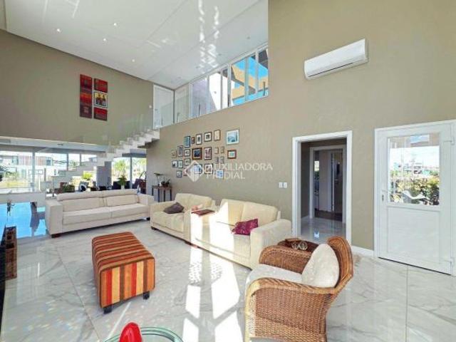 Casa em Condomínio beira lago para comprar com 300m², 3 dormitórios, 3 suítes, 2 vagas em Eldorado