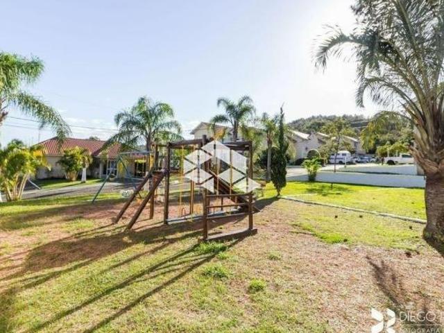 CASA EM CONDOMÍNIO DOIS DORMITÓRIOS