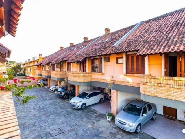 CASA EM CONDOMÍNIO DE 3 DORMITÓRIOS NO BAIRRO TRISTEZA POA/RS