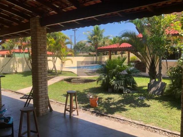 Casa em Condomínio de Luxo em Peruíbe: 3 Quartos, 2 Suítes e 246m² de Área na Est. São Marcos!