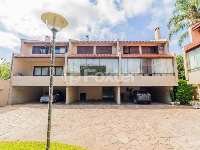 Casa em Condomínio em condomínio com 3 dormitórios em Porto Alegre