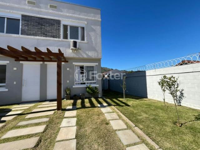 Casa em Condomínio em condomínio com 2 dormitórios em Porto Alegre
