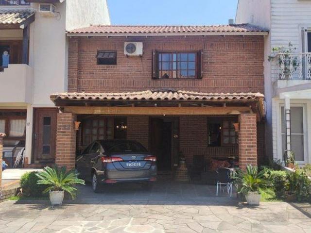 Casa em Condomínio em Cavalhada
