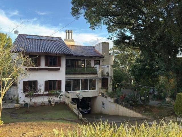 Casa em Condomínio em Cavalhada