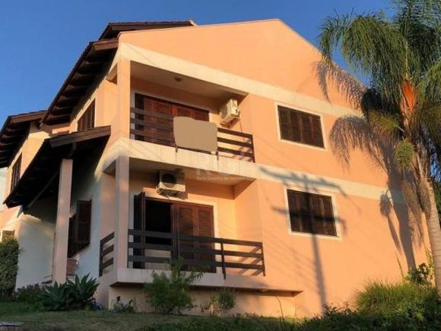 Casa em Condomínio em Cavalhada