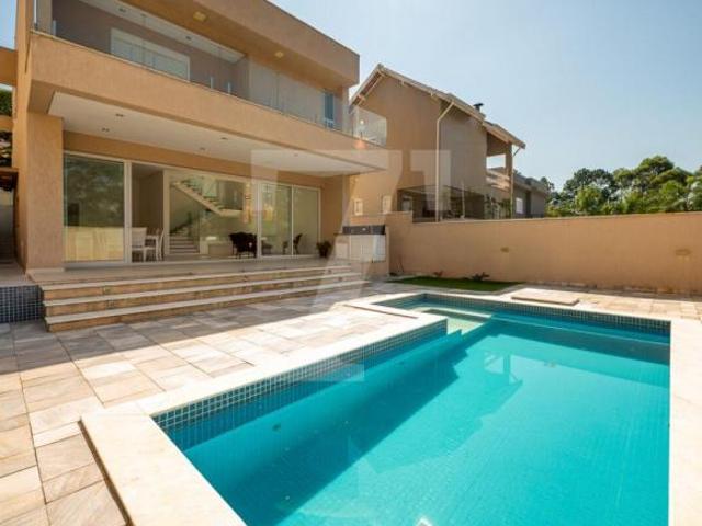Casa em condomínio em Alphaville à venda com 4 suítes e escritório com piscina