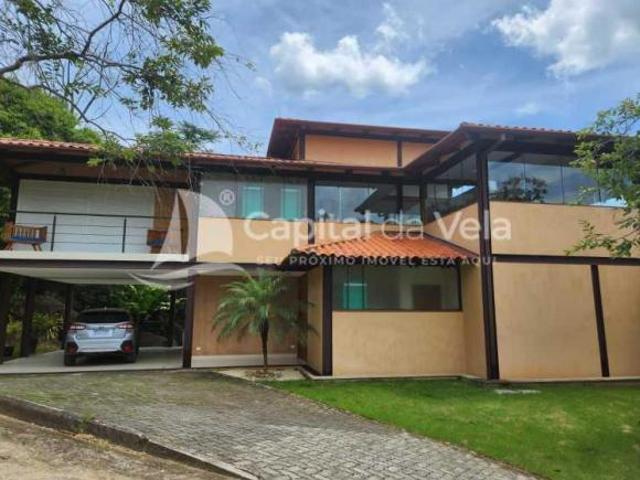 CASA EM CONDOMÍNIO EM FRENTE A PRAIA