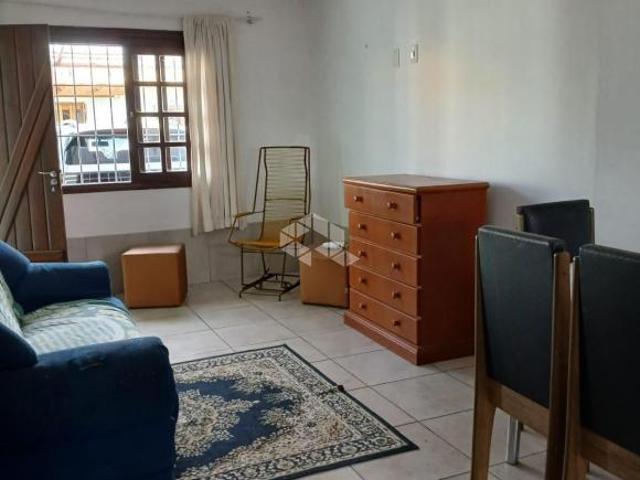 CASA EM CONDOMINIO EM TRAMANDAI