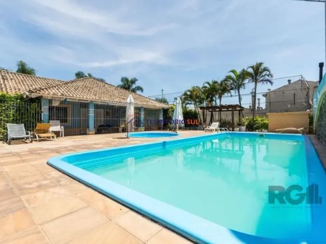 Casa em condomínio fechado 70m², 2 dormitórios, 1 vaga de garagem no bairro Humaitá